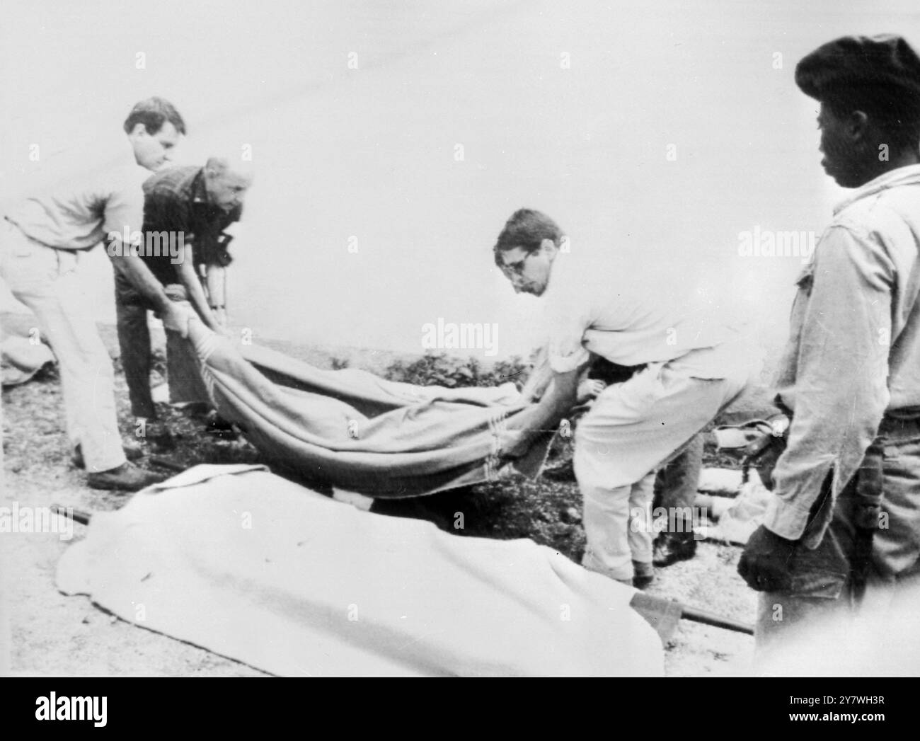 Stanleyville : Bodies of shot hostages are shown being lined up in ...
