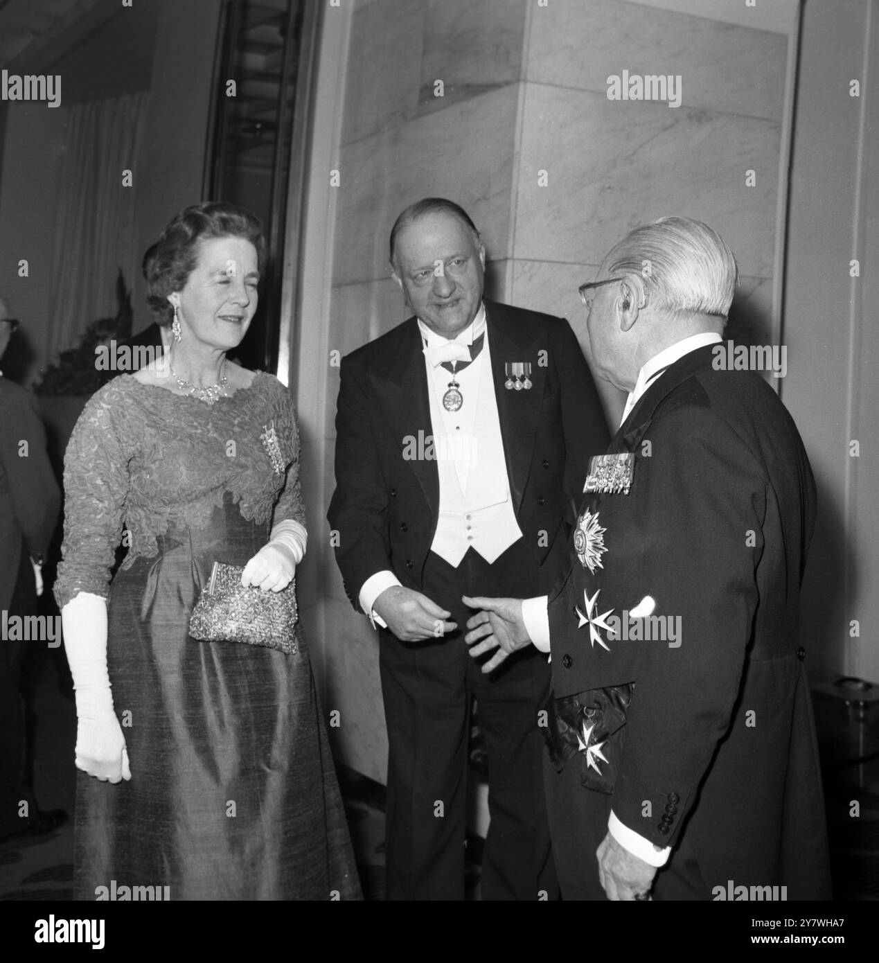 Lord Bossom , (right) President of the Iran Society , greets Mr R A ...
