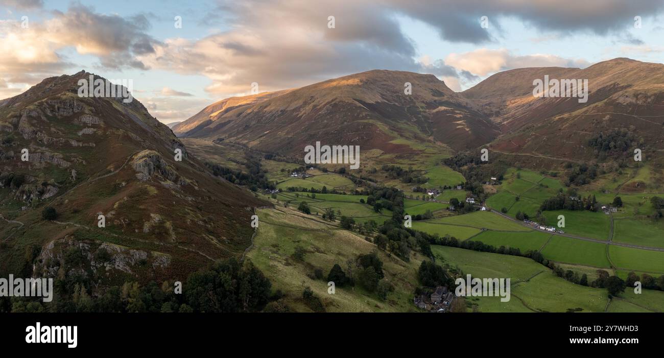 An aerial panoramic view of Helm Crag and Helvellyn mountains in The ...