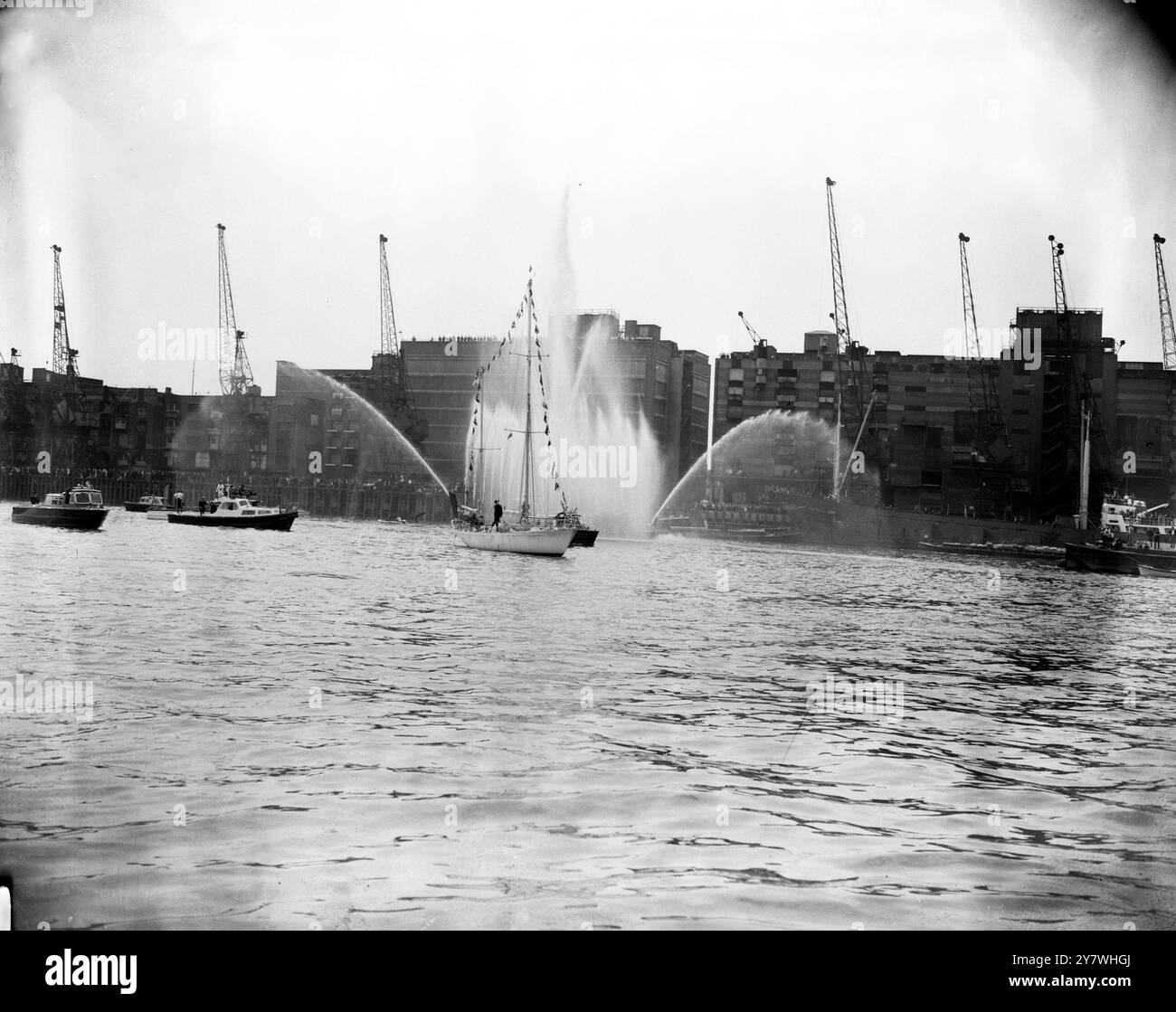 A water display by vessels of the Thames fire boats welcomes Gipsy Moth ...