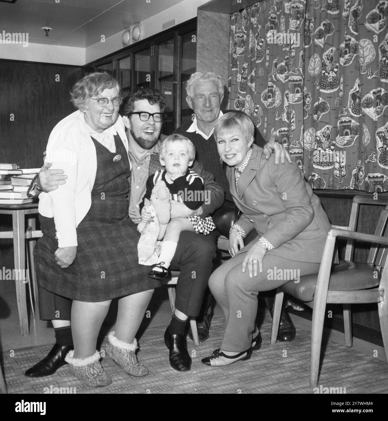 A happy family reunion for entertainer Rolf Harris on board the liner ...