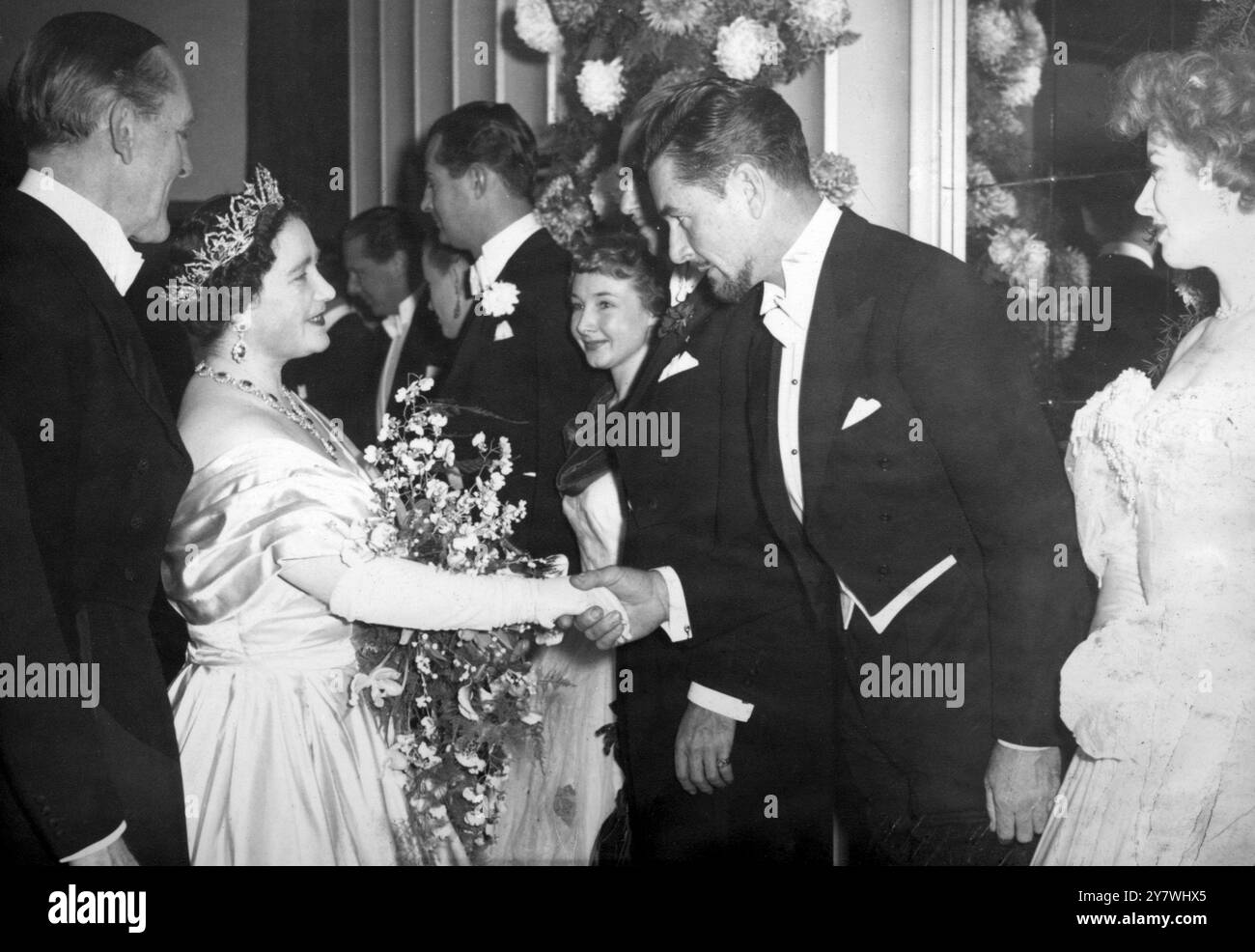 Presentation to the Queen at the royal Command Film Performance. Errol ...
