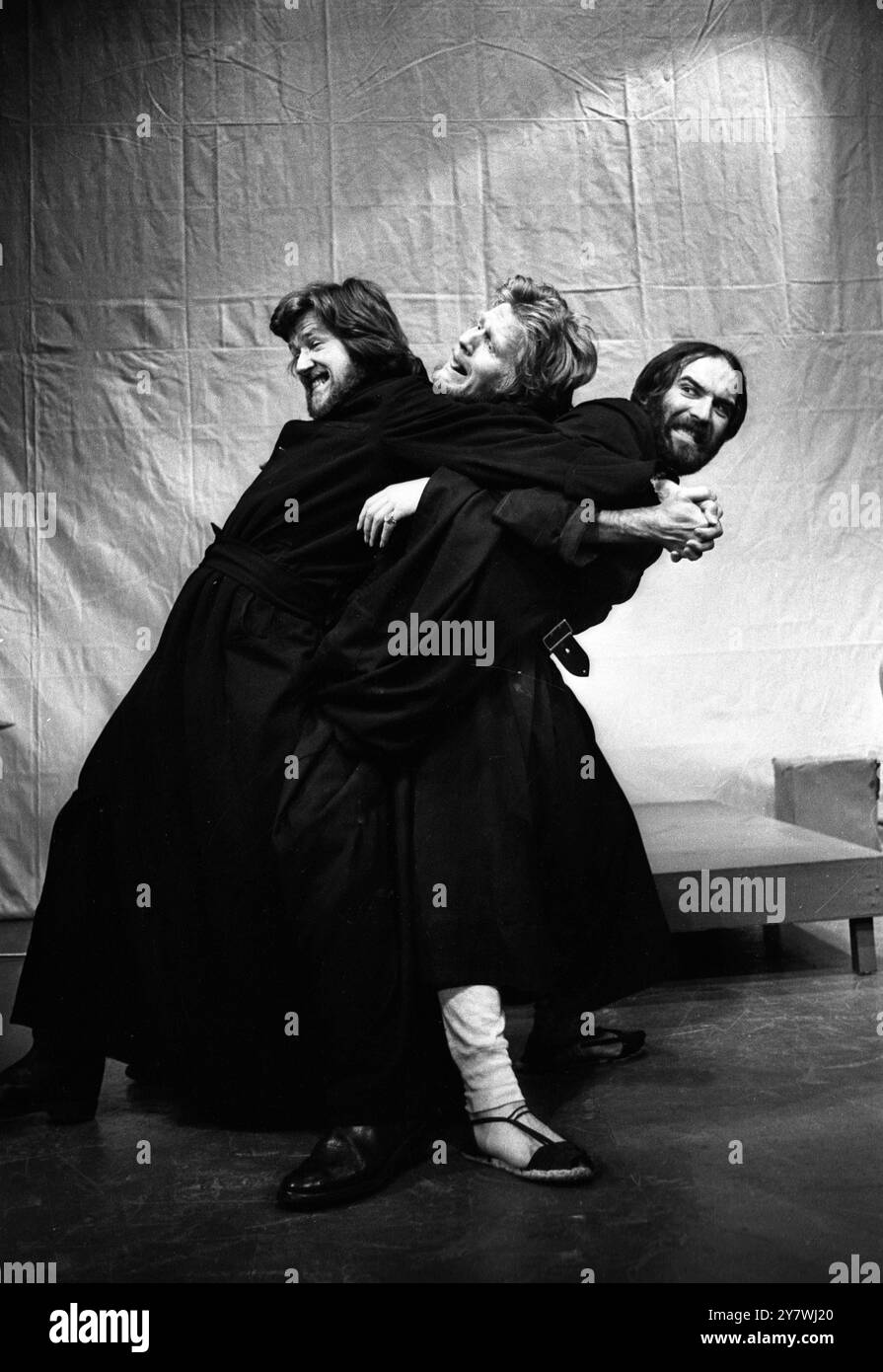 Rasputin wrestles with two fellow monks in a scene from " The Rasputin ...