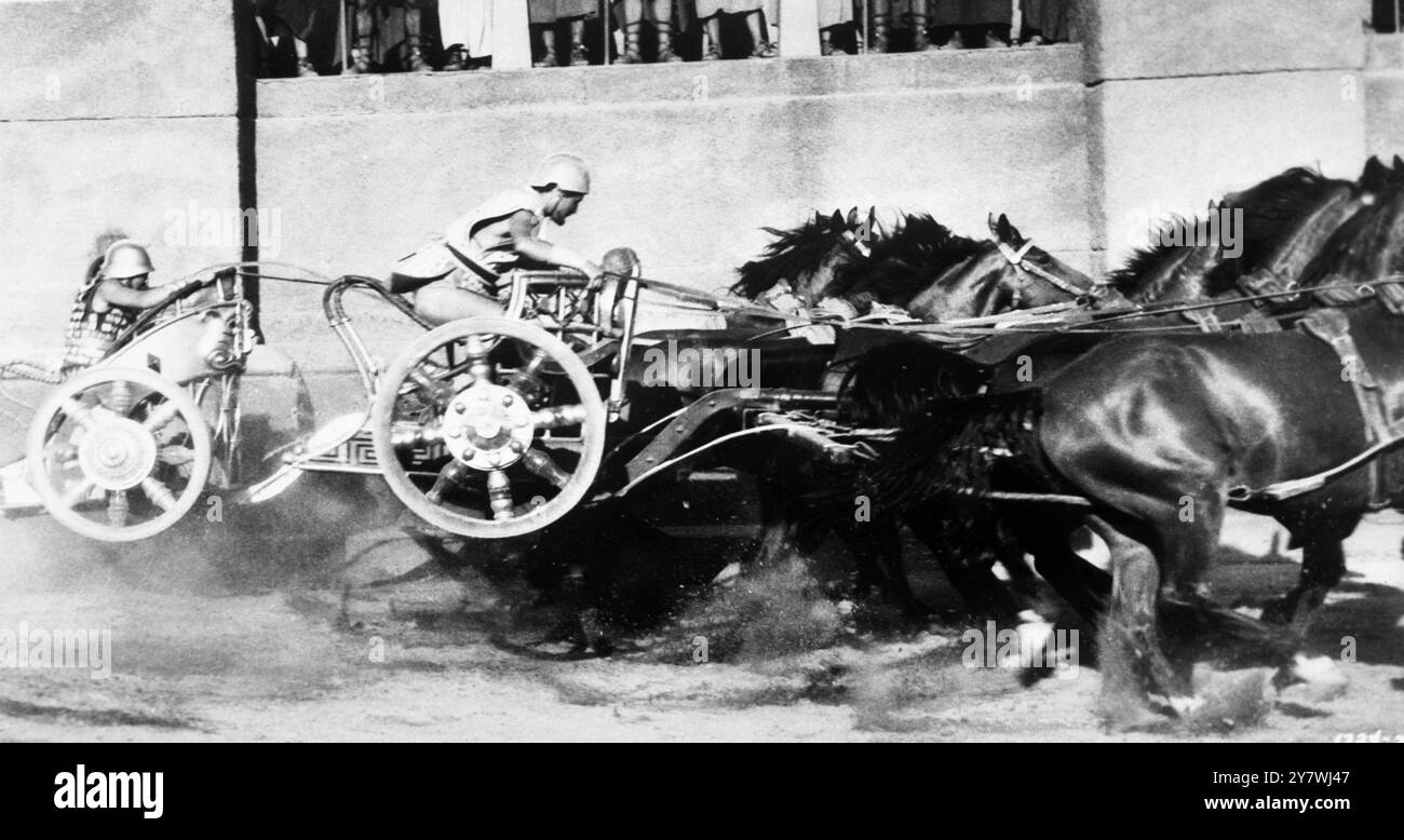 Dramatic chariot race scene from the MGM film of Ben Hur, the struggle ...
