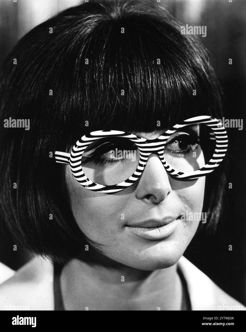 Kathy Rowe is a really dazzling damosel in black and white striped op ...