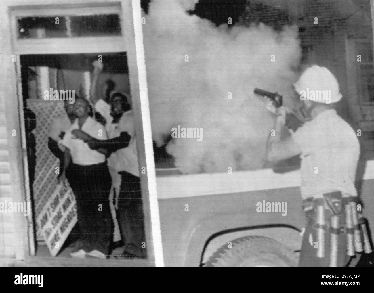Police shout at crowd Black and White Stock Photos & Images - Alamy