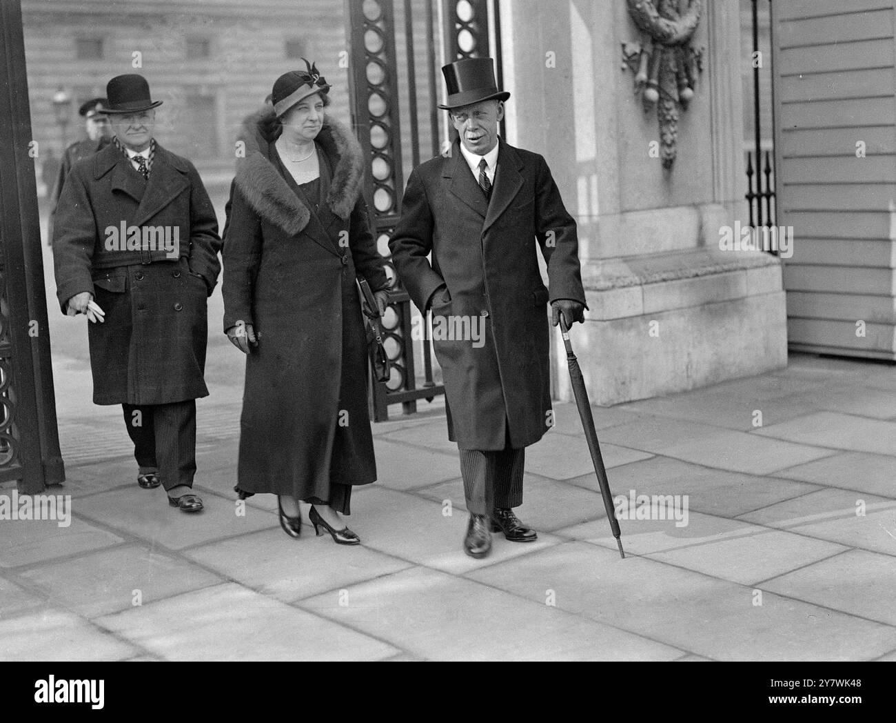 Investiture at Buckingham Palace . Mr A E . Baxter and Mrs Gower , both ...