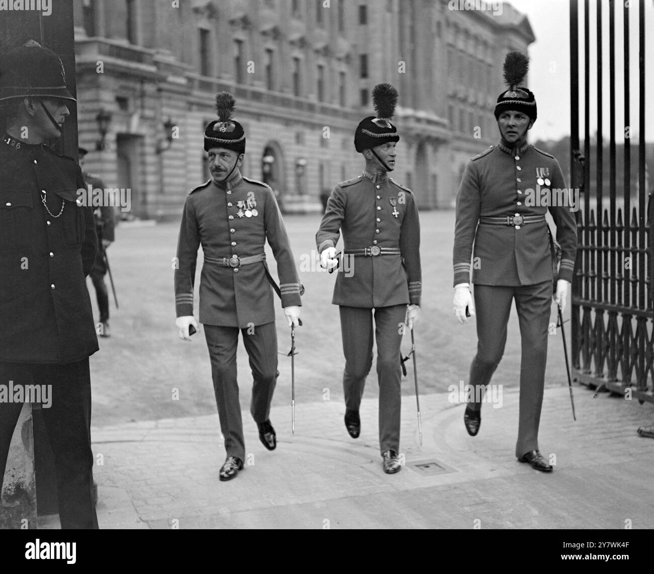 Investiture at Buckingham Palace . Wing Commander Belfield , O . B . E ...