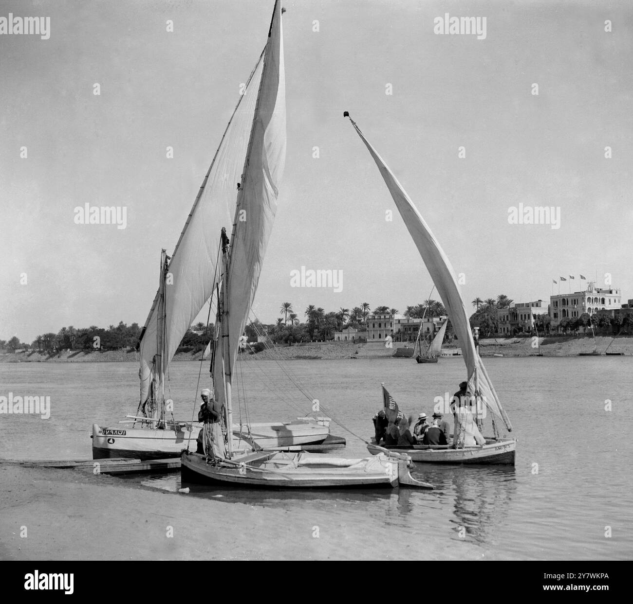 English tourists crossing the River Nile on the native Feluccas , the ...