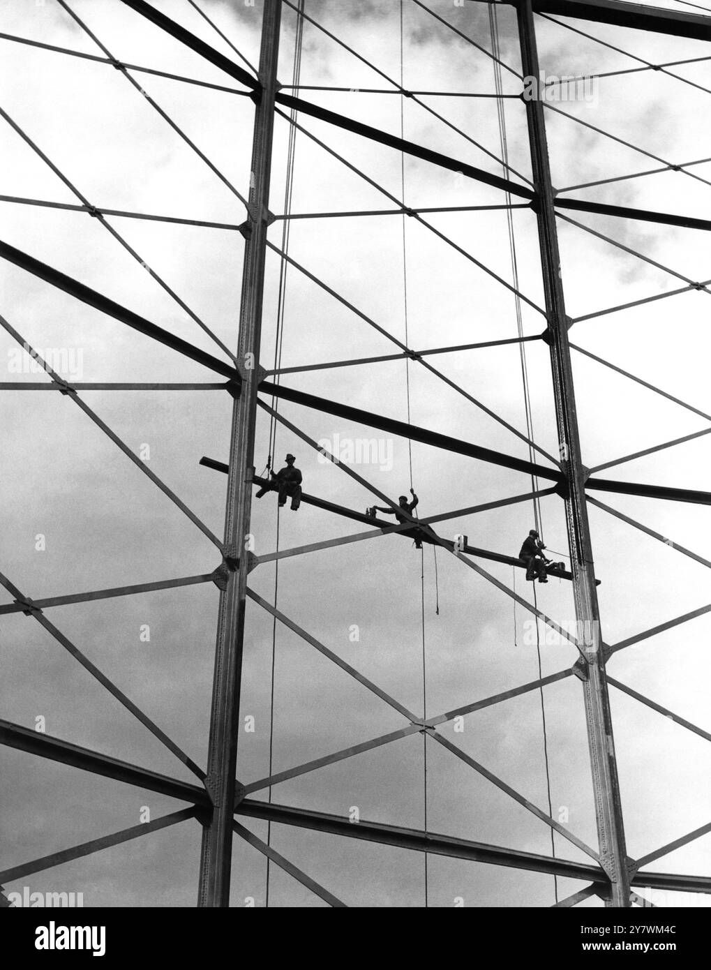 Painting a gasometer in 1946 Stock Photo - Alamy