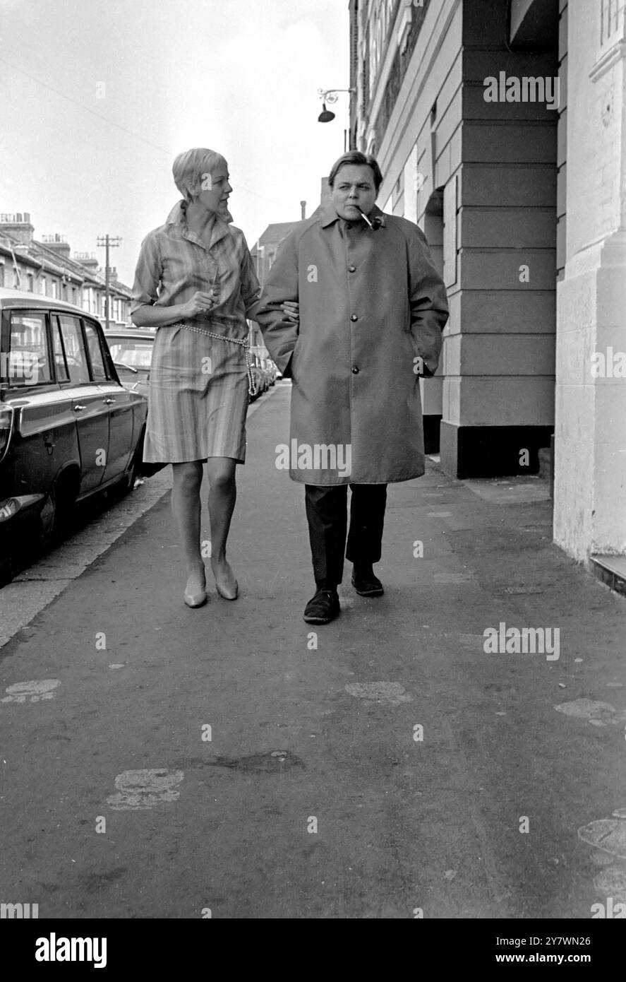 Actor Bill Wallis wearing a raincoat popularised by Premier Harold ...