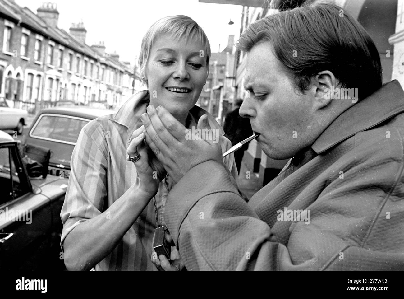 Actor Bill Wallis wearing a raincoat popularised by Premier Harold ...
