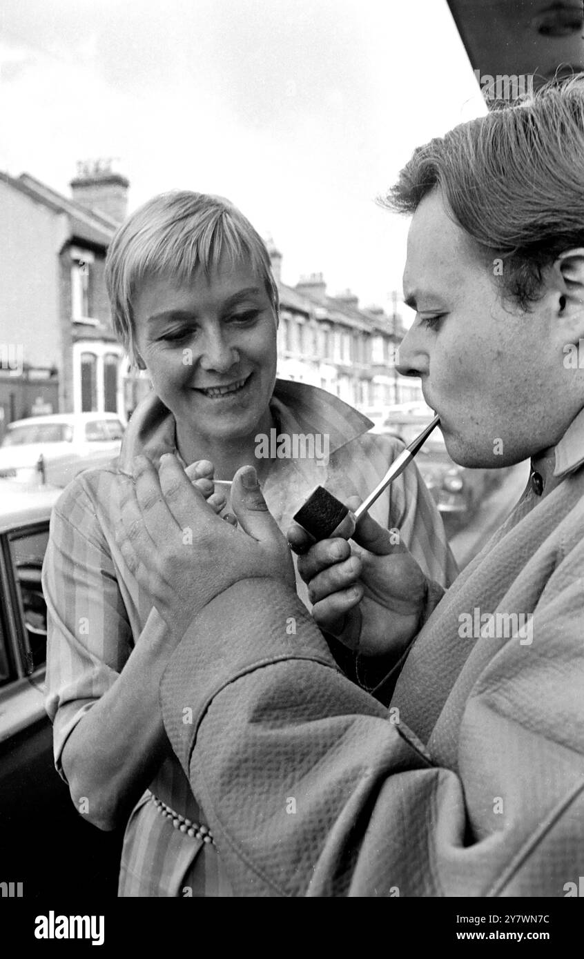 Actor Bill Wallis wearing a raincoat popularised by Premier Harold ...