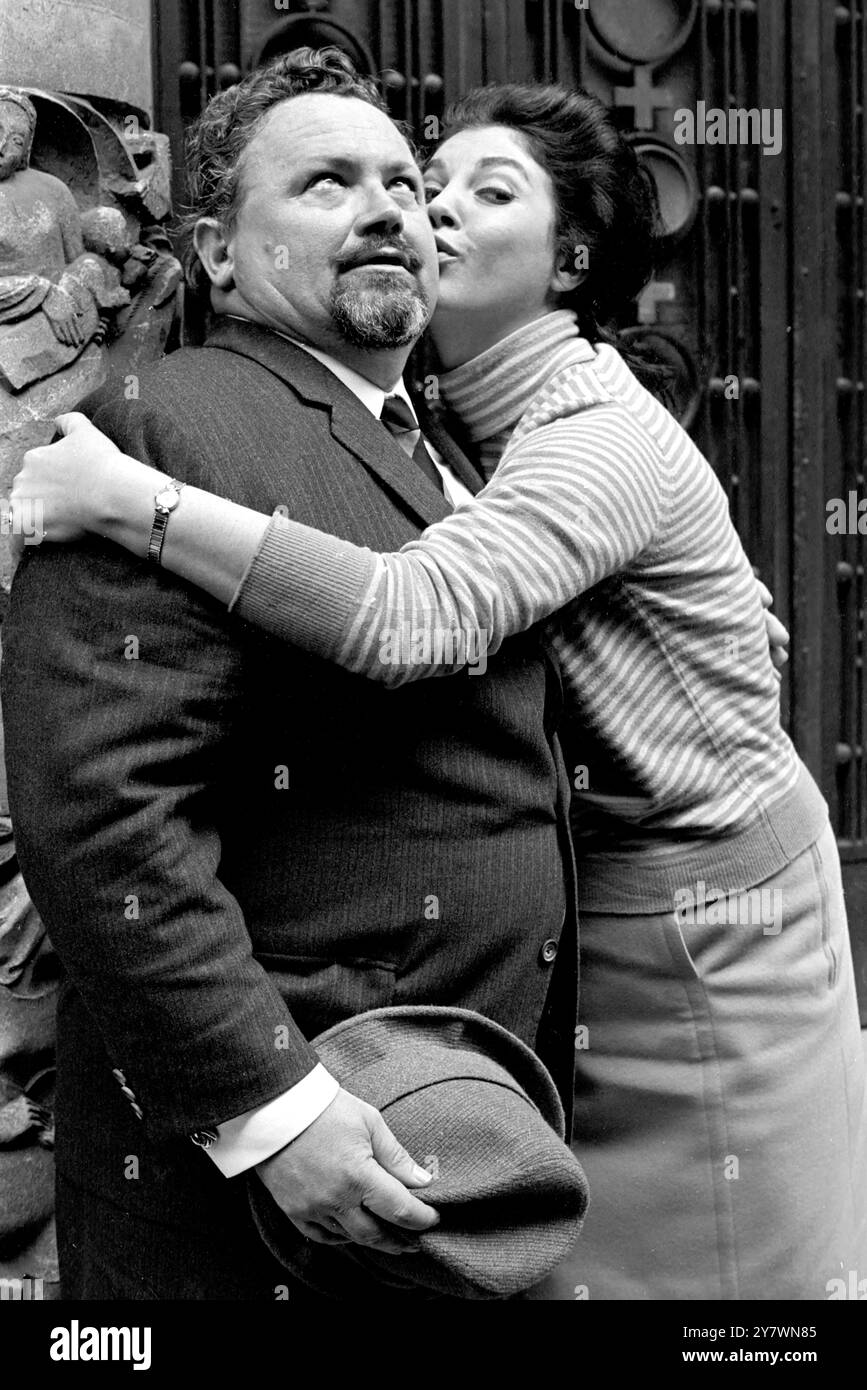 Comedian Harry Secombe receives some fond treatment from his mistress ...