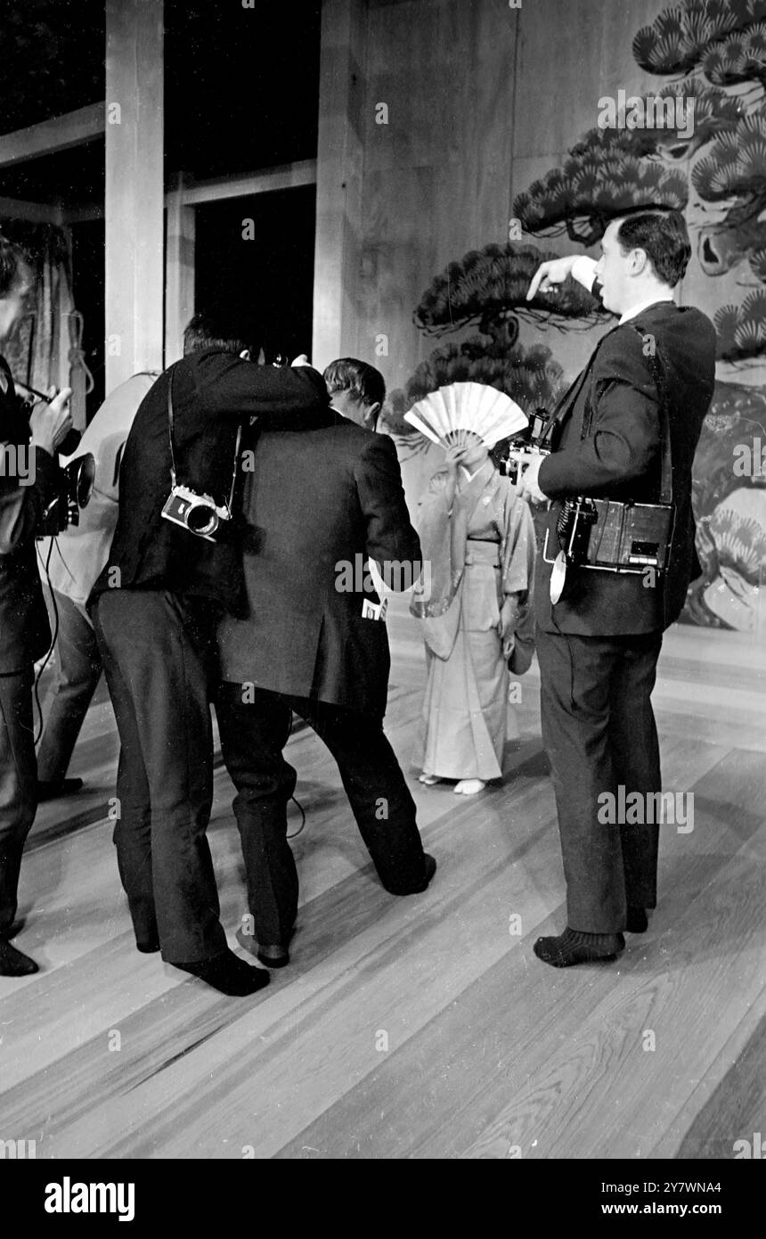 Press photographers after a scene from The Tied Servants one of three ...