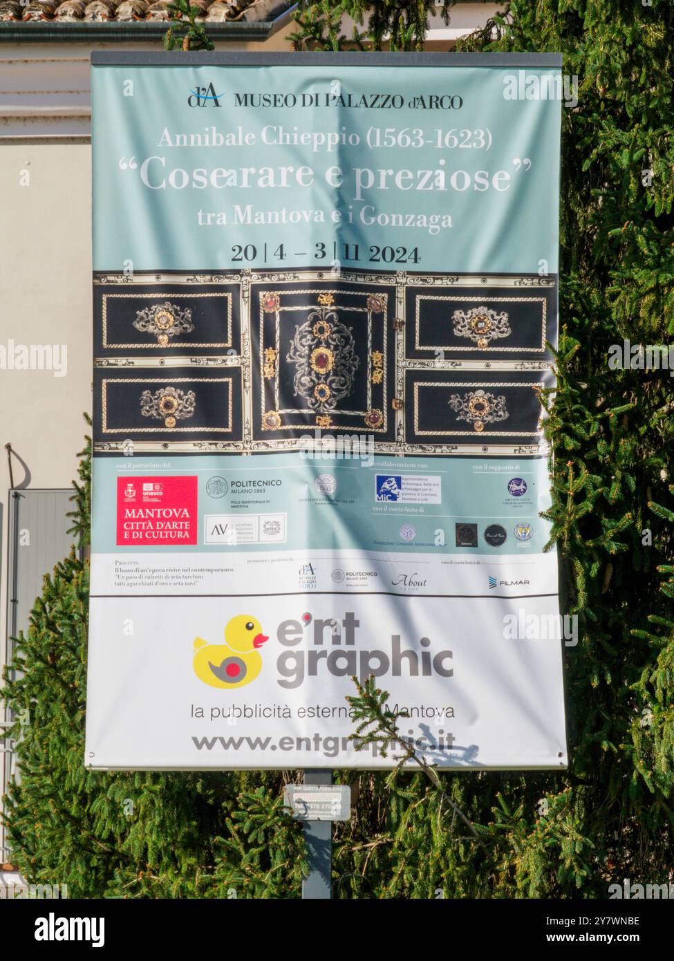 Mantua, Italy September 30th 2024 Billboard announcing an exhibition of rare and precious ...