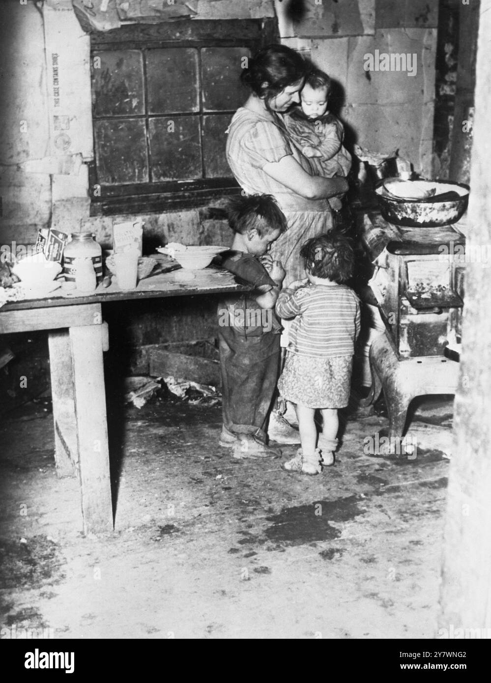 Combs, Kentucky. Mrs Baker in the kitchen of their company-owned home ...