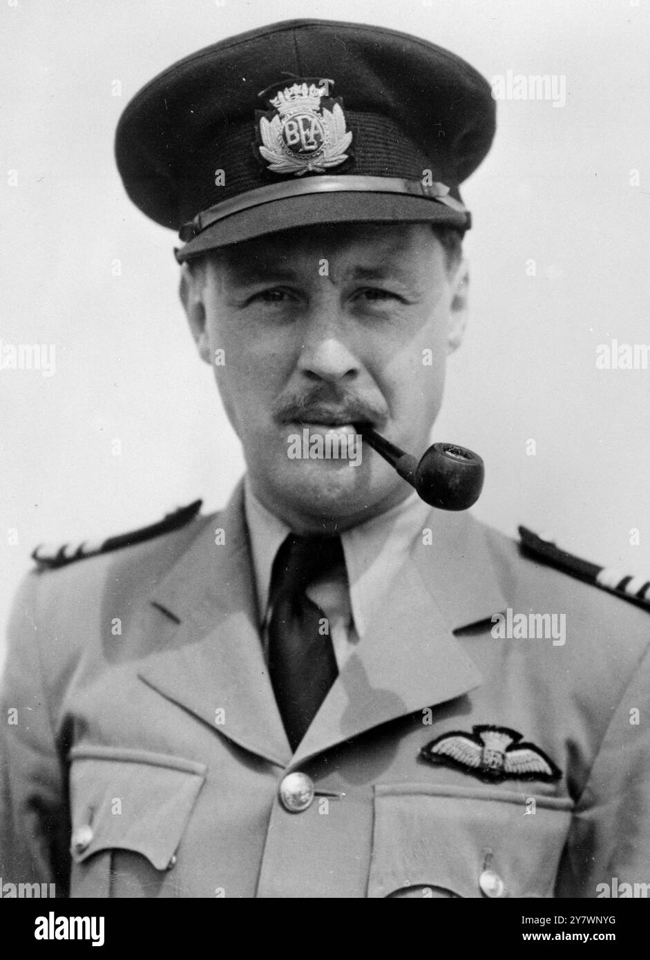 Captain Ian Richard Harvey D . F . C . of pinner , Middlesex , pilot of ...