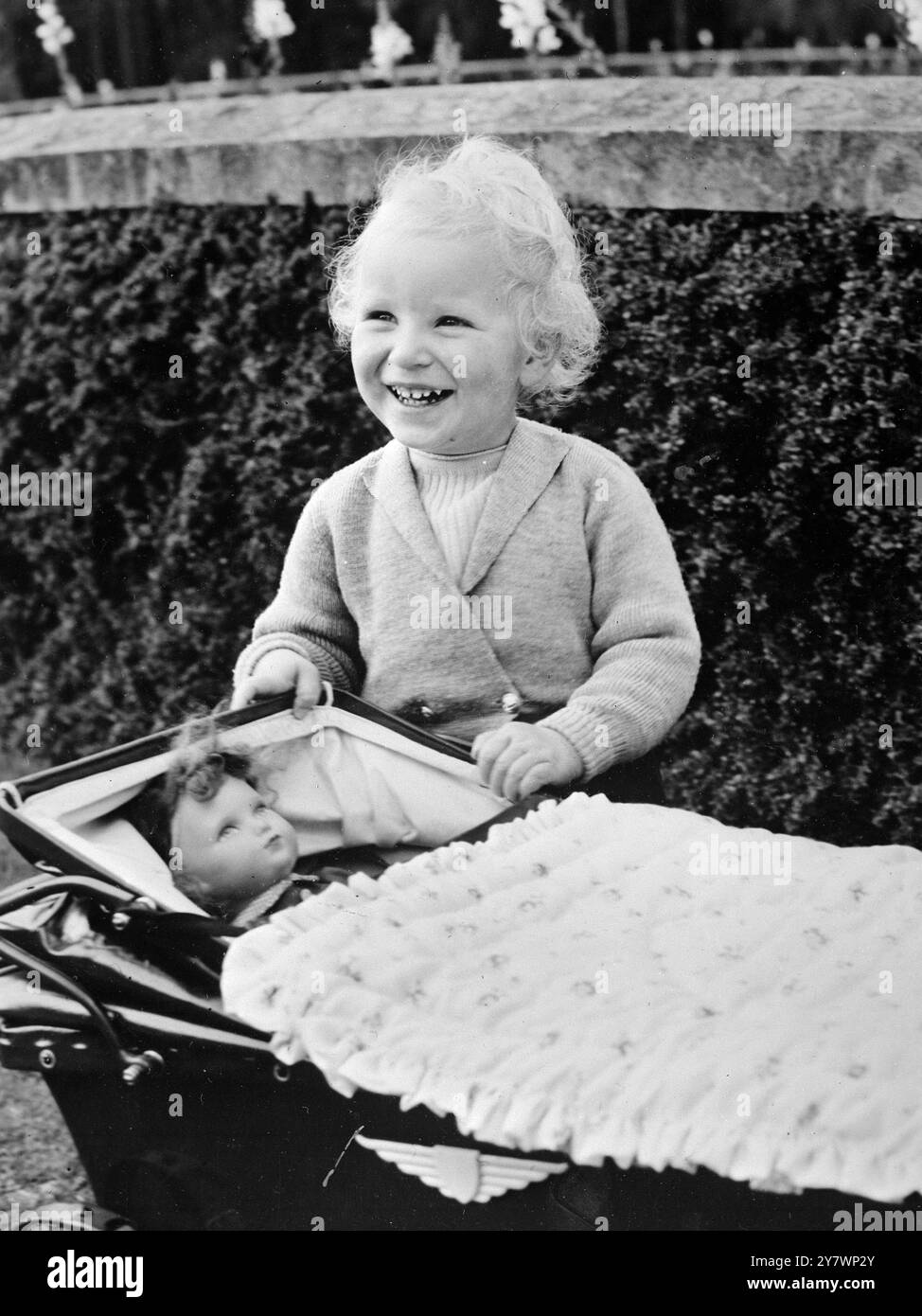 Princess Anne playing with her doll's pram in the grounds of Balmoral ...