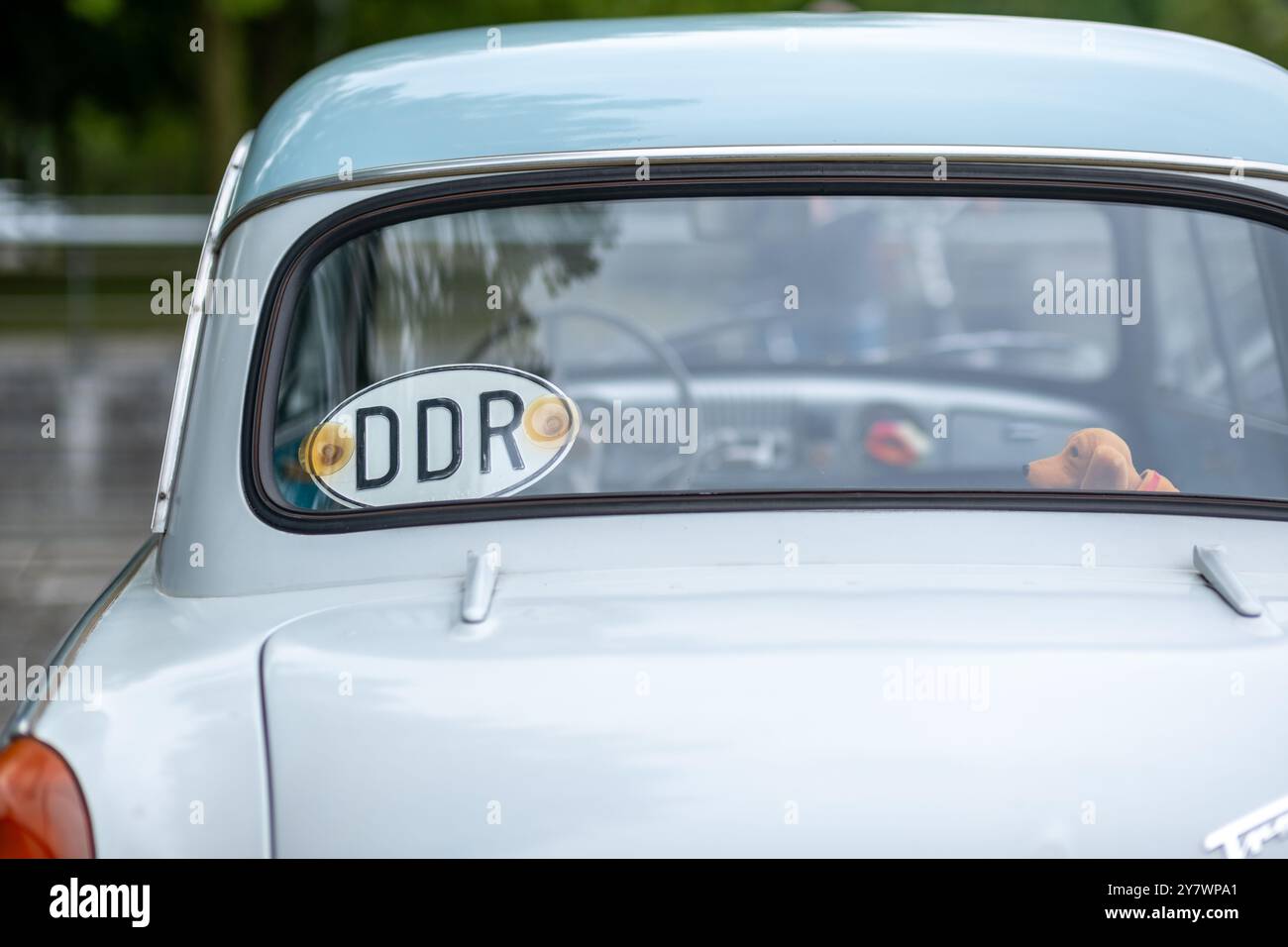 A classic vintage car with a DDR sign on the rear window, showcasing ...