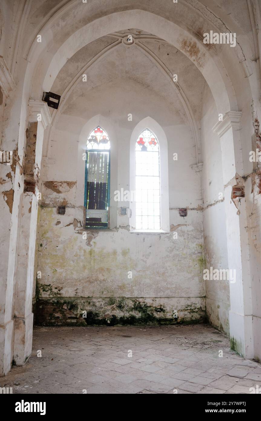 Abandoned Gothic Church Interior with Crumbling Walls and Stained Glass ...