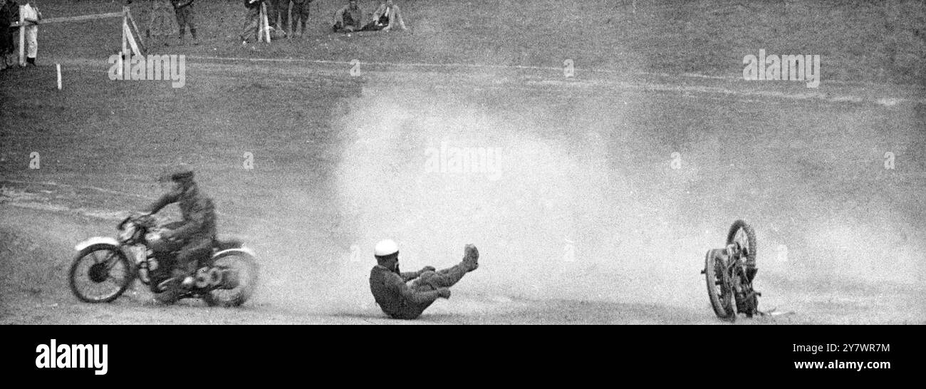 Cyclist skids across the track after coming off his motorbike ©TopFoto ...
