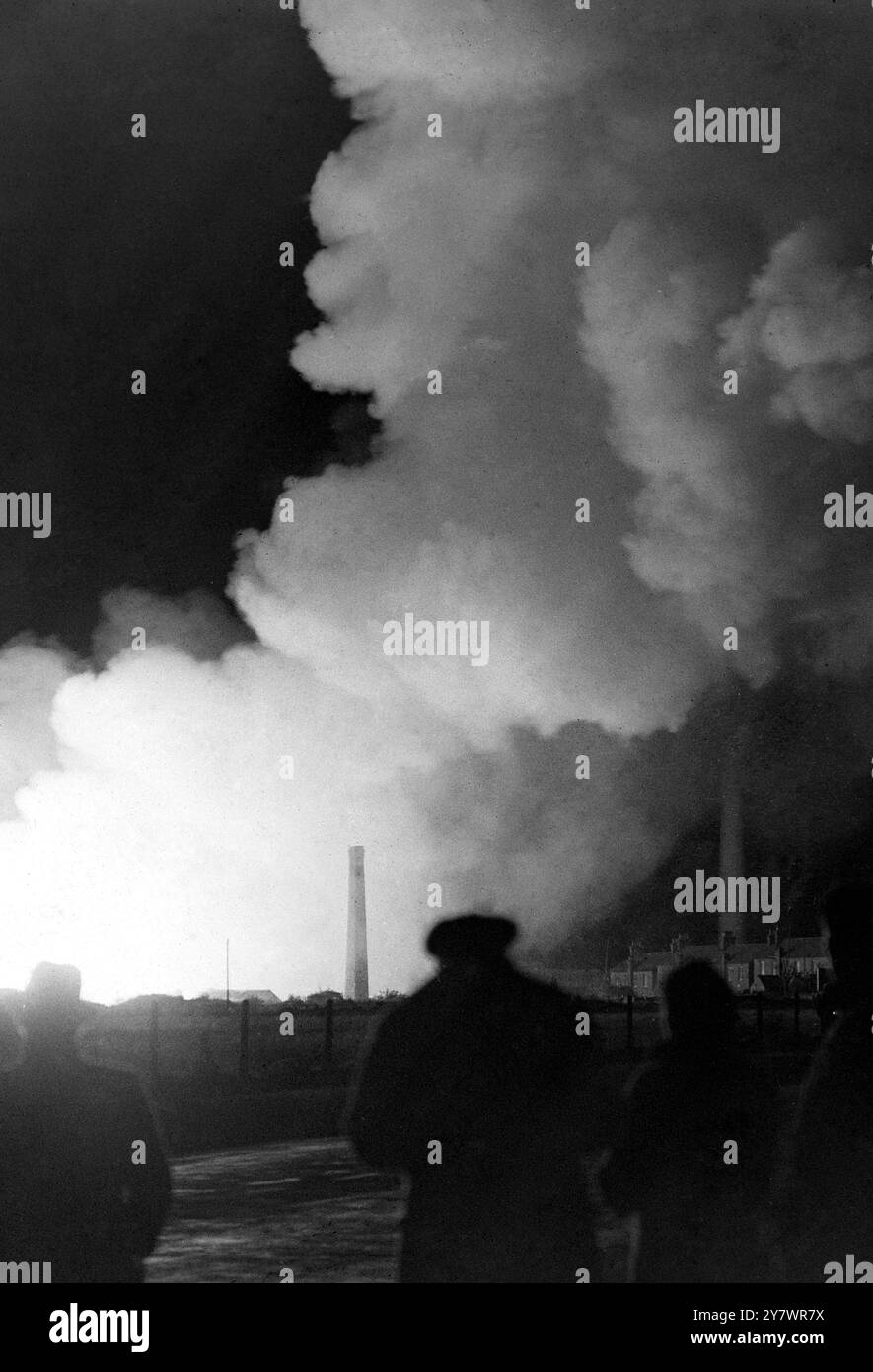 Smoke billowing from bomb damage fire ©TopFoto Stock Photo - Alamy