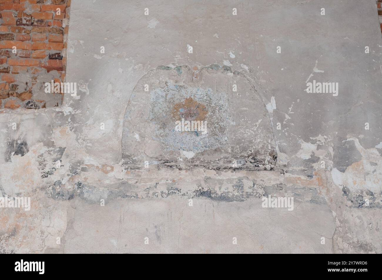 A Desolate Wall with Faded Historical Murals in an Abandoned Structure ...