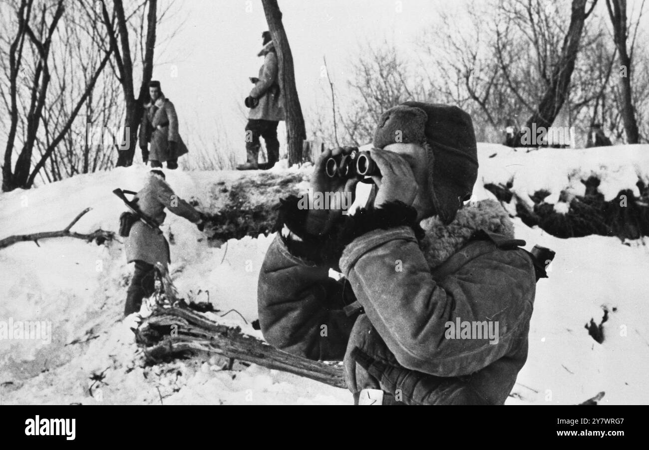 Damansky Island , Russian-China border A Russian border guard keeps ...