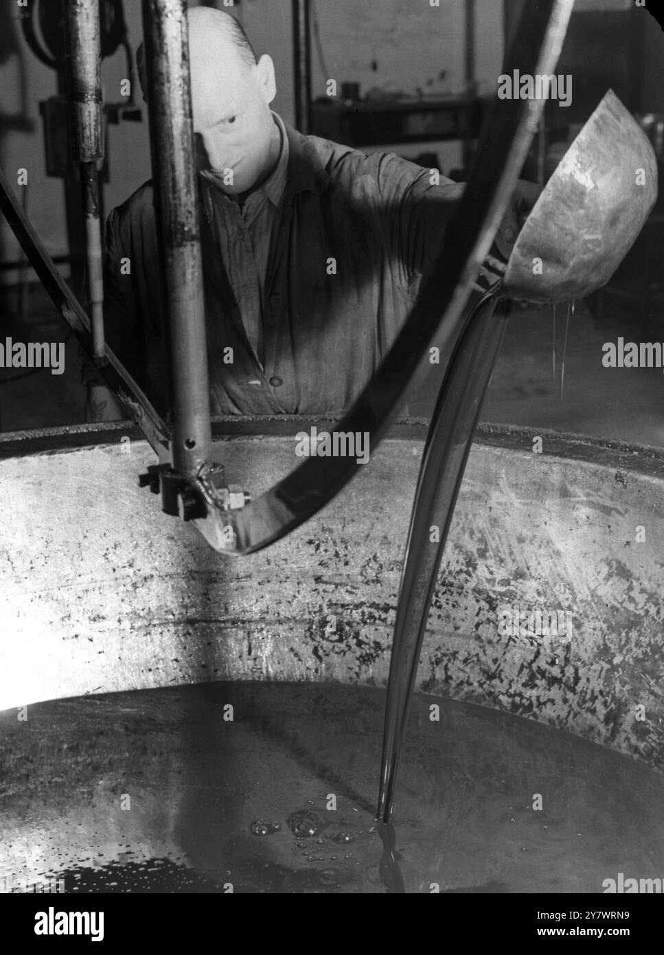 Ladle pouring Black and White Stock Photos & Images - Alamy