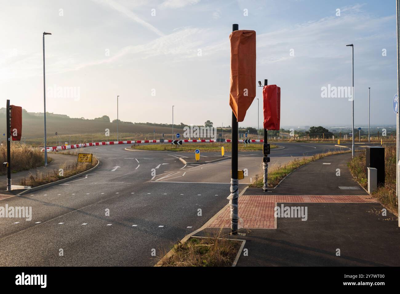 New build road toward new housing development estate in england uk ...