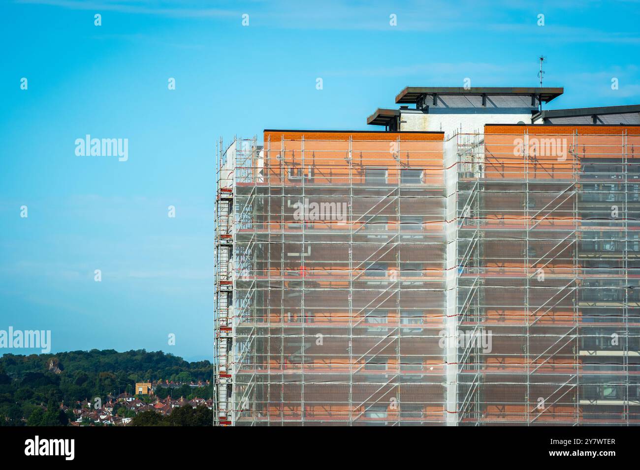 Scaffold sheeting net wrapped apartments building during insulation in ...
