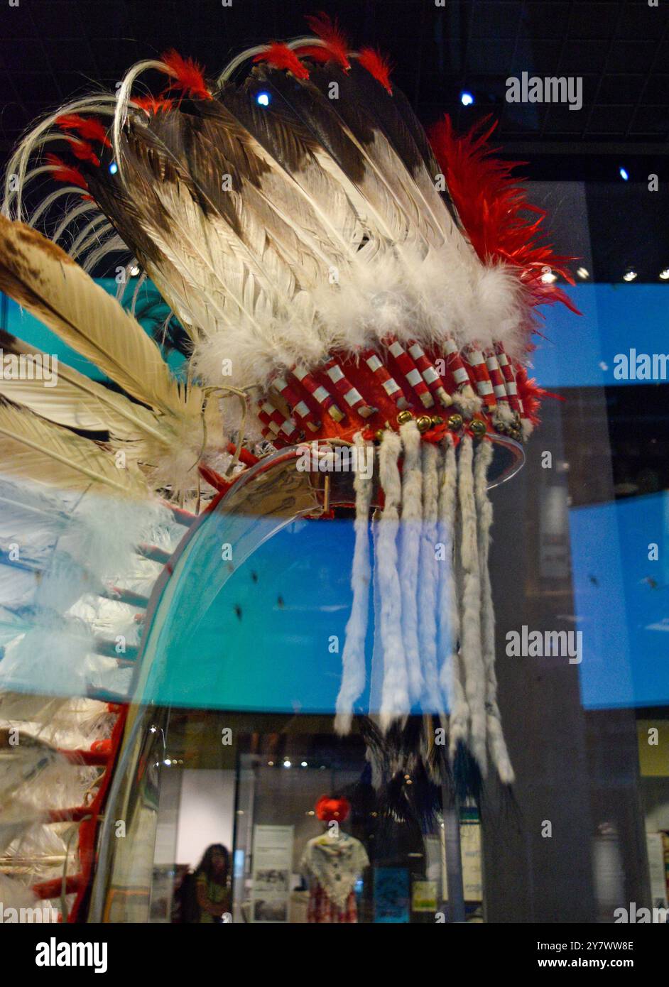 Native American headdress displayed in a showcase, highlighting its ...