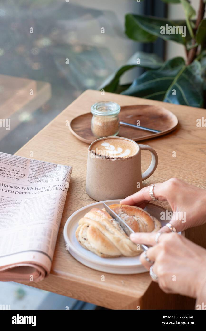 Womans hand adding milk coffee hi-res stock photography and images - Alamy
