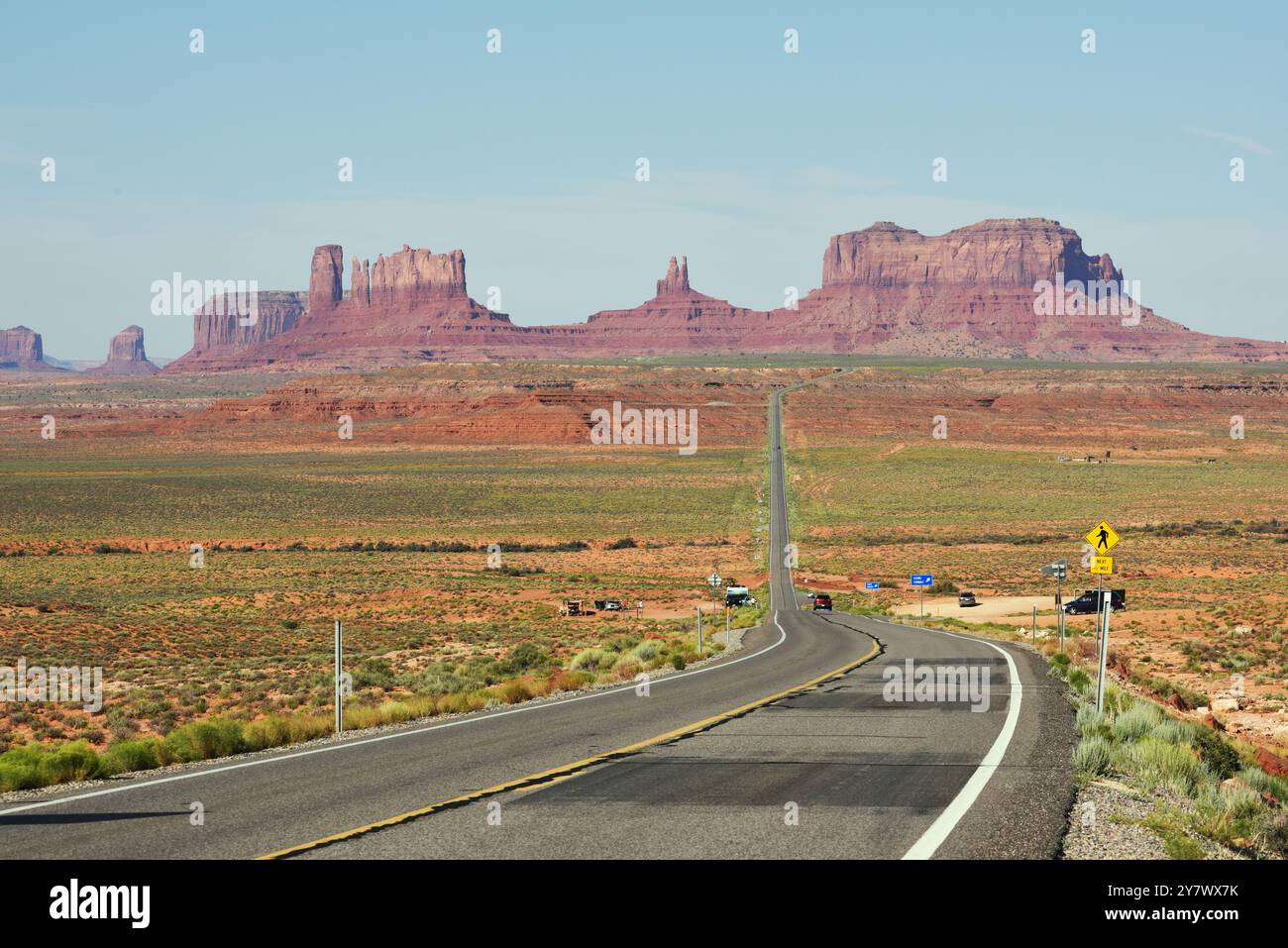 Iconic, towering red sandstone buttes and mesas rise dramatically from ...