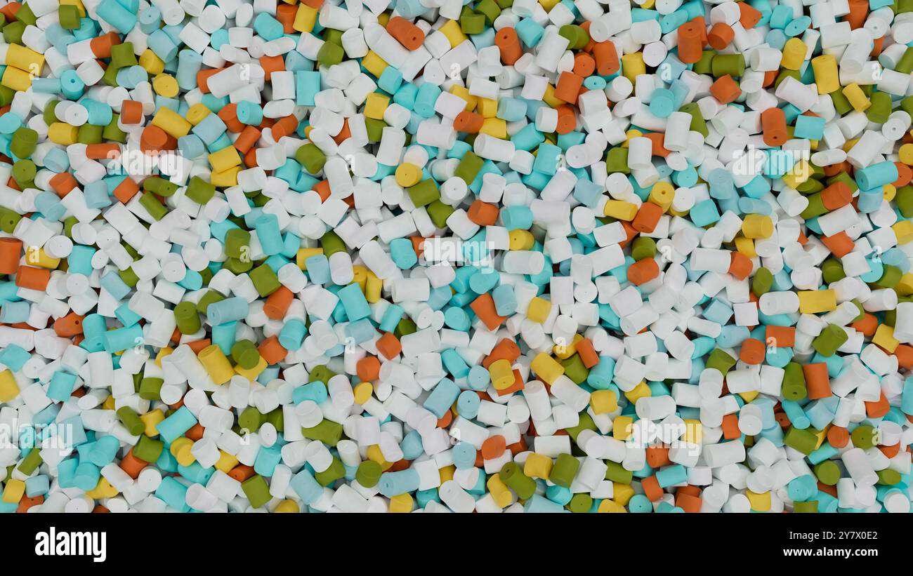 Closeup top view of colorful mixed plastic polypropylene granules ...