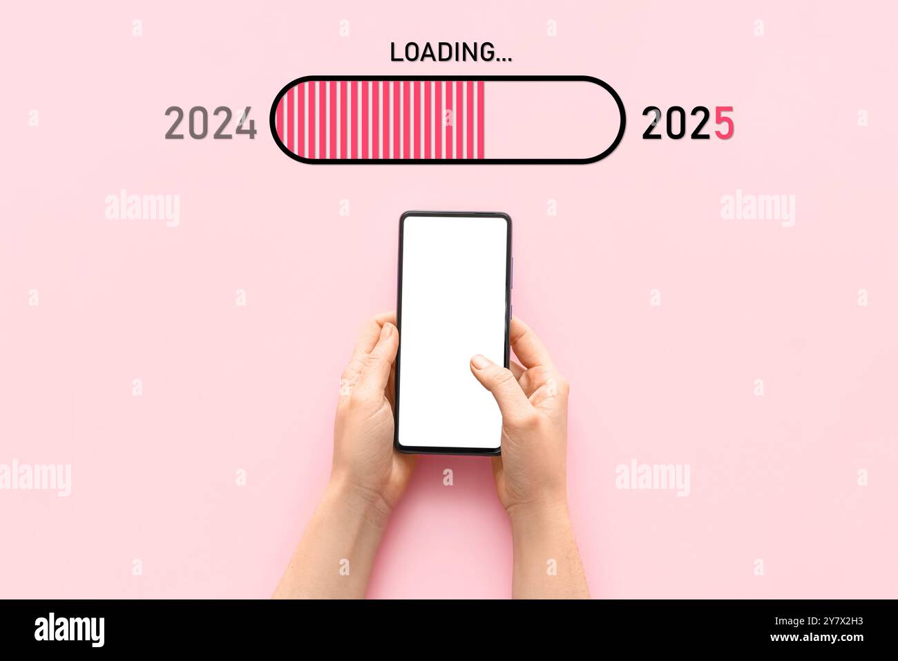 Hands holding mobile phone and status bar with year 2024 and 2025 on ...