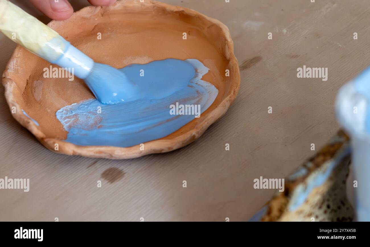 Samples of ceramic art objects and tabelware made on workshop in art ...