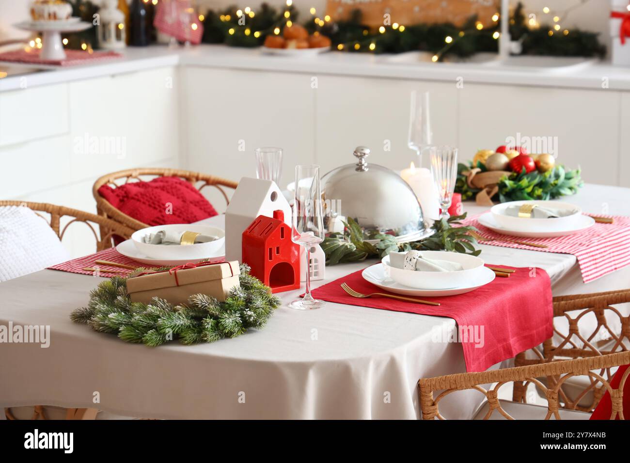 Christmas table setting with wreathes, decorations and cloche Stock ...