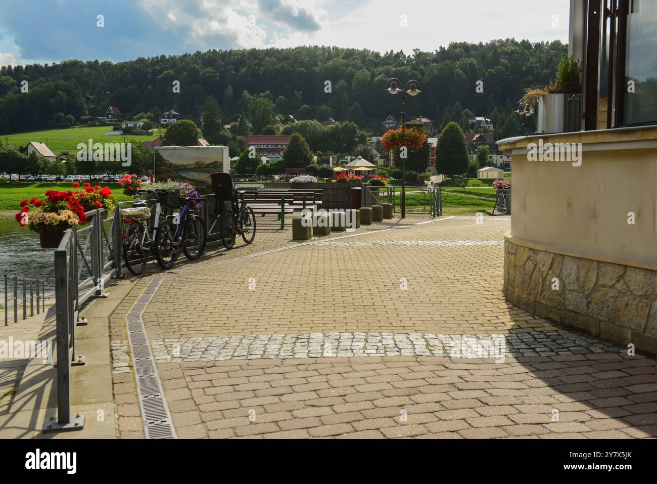 View of German village with beautiful houses and forest Stock Photo - Alamy