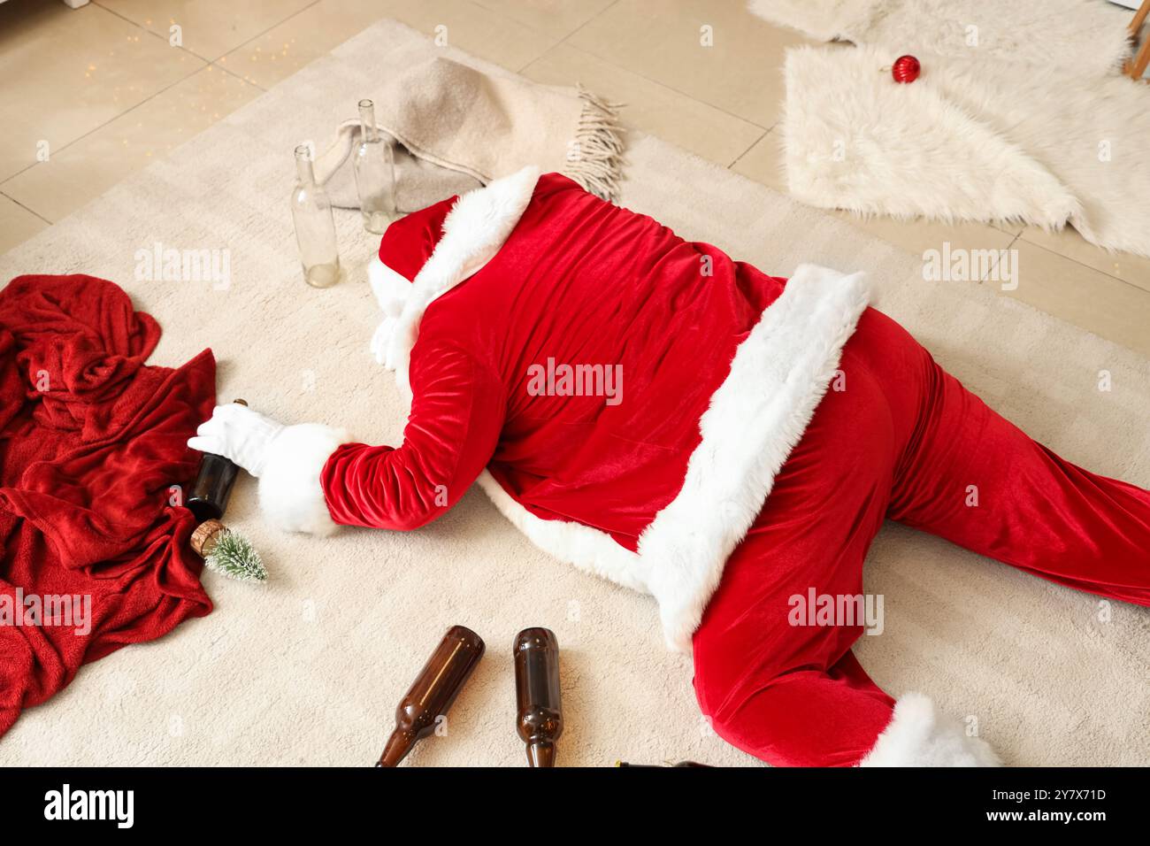 Santa claus lying on floor hi-res stock photography and images - Alamy