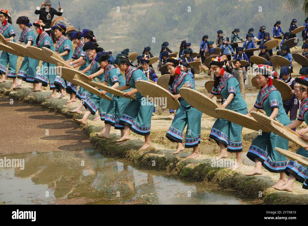 Hani Akha women sifting rice at a festival in Yuanyang China Stock ...
