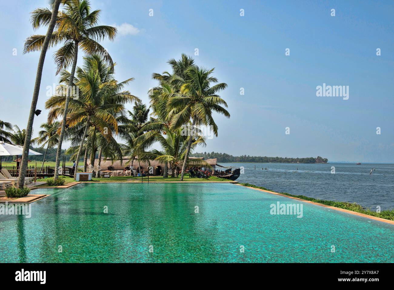 luxury resort swimming pool in the backwaters of Kerala, India Stock ...