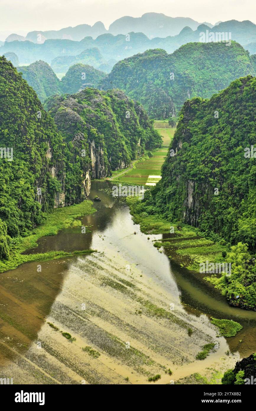 beautiful limestone karst mountains over the Tam Coc River in Ninh Binh ...