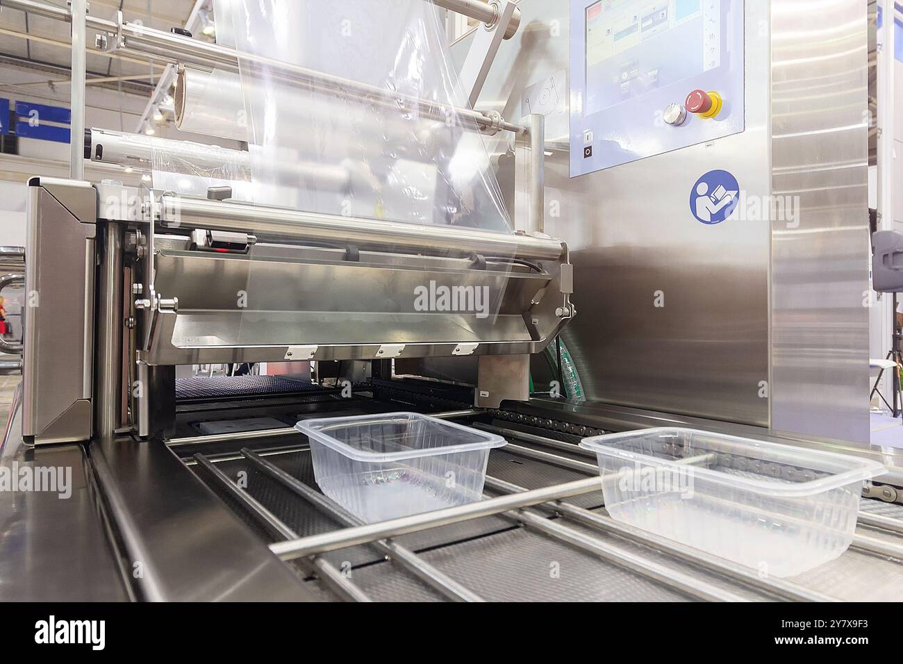 Automatic industrial machine for plastic packaging food. shaft of an ...