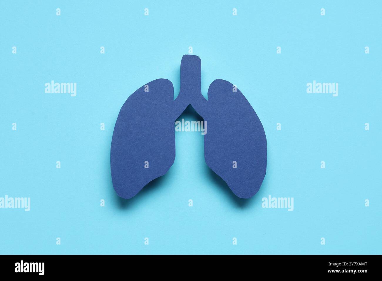 Paper lungs on color background Stock Photo - Alamy