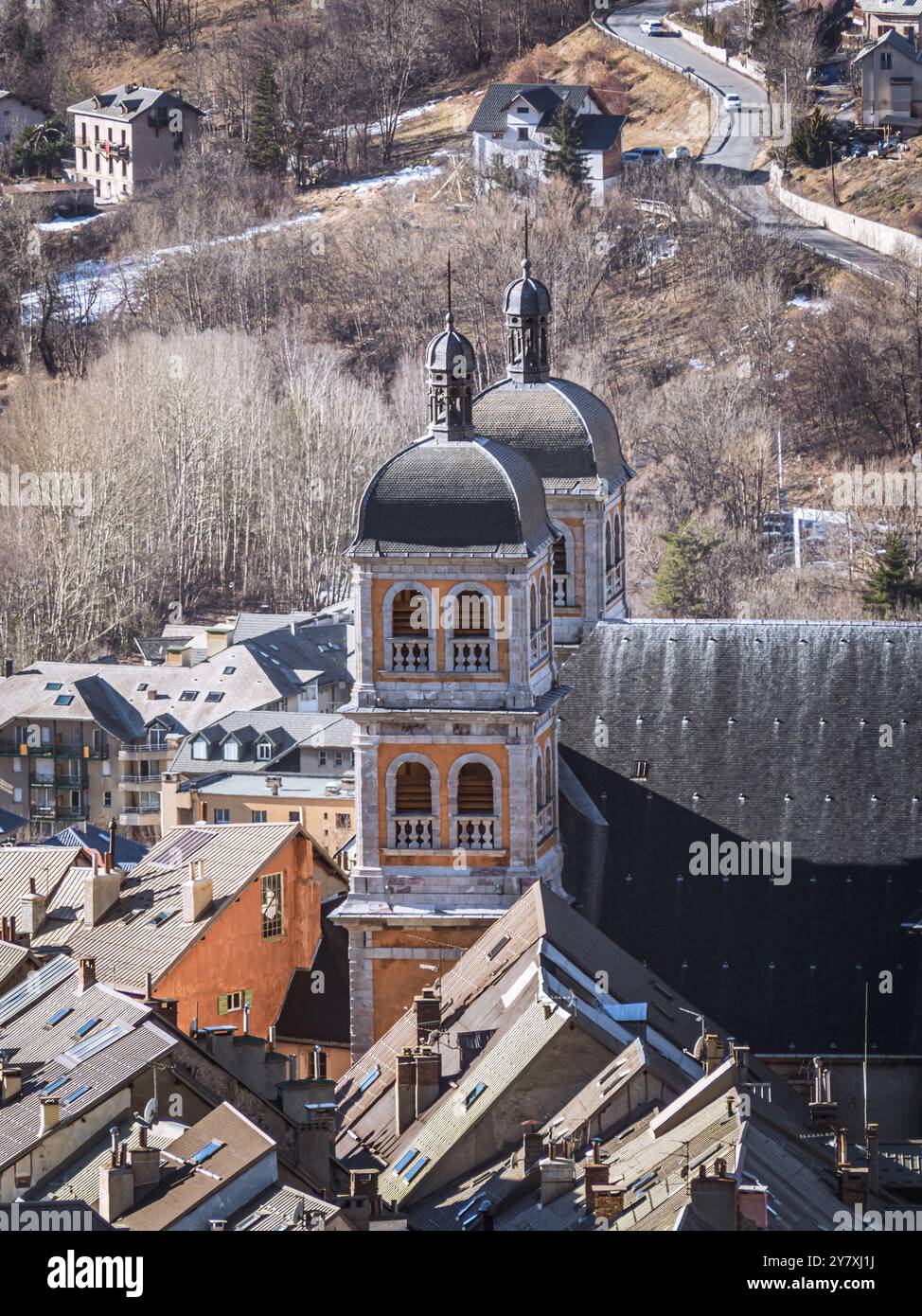 A view of Briançon’s historic buildings, featuring a charming church ...