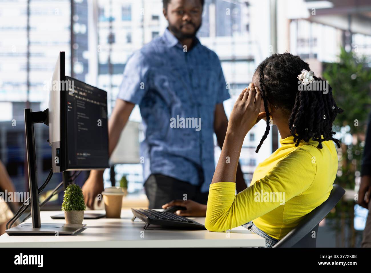 Programmer doing software debugging, asking for help from coworker ... Programmer doing software debugging, asking for help from coworker ...