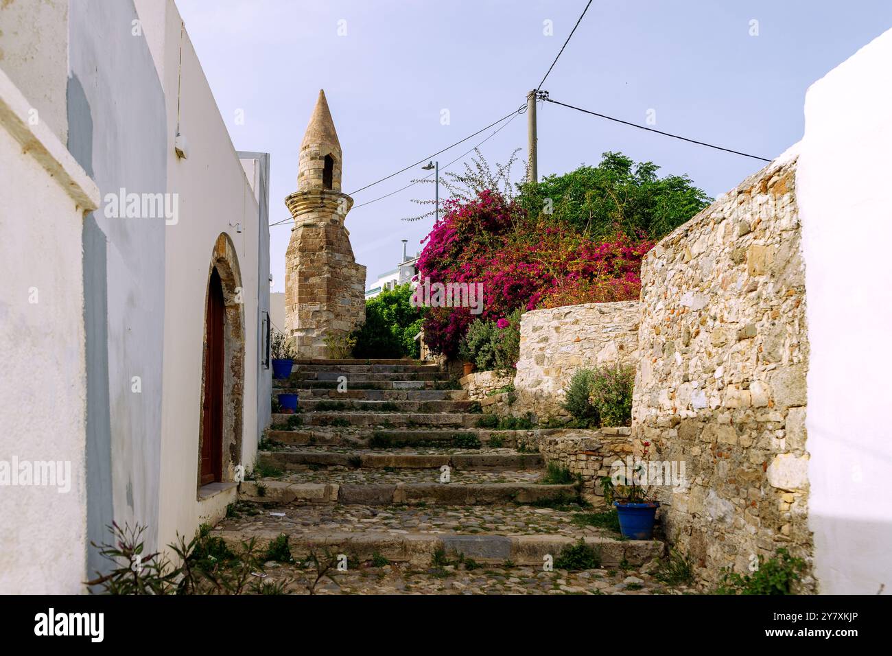 Staircase to the western archaeological site and minaret of the former ...
