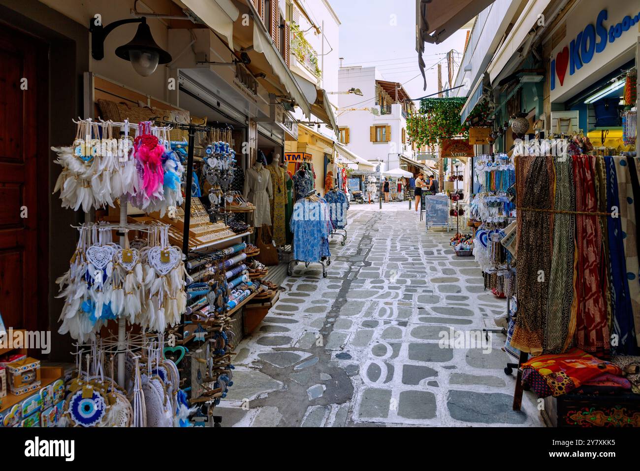 Shopping street Odos Ifestou with souvenir shops in Kos Town on the ...